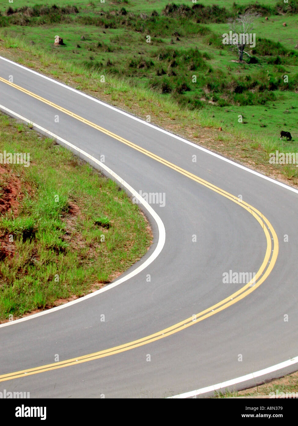 Curve in a road Stock Photo - Alamy