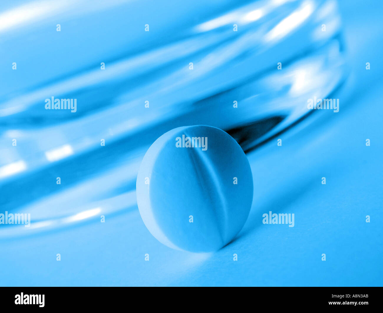 Pill and a glass of water Stock Photo - Alamy