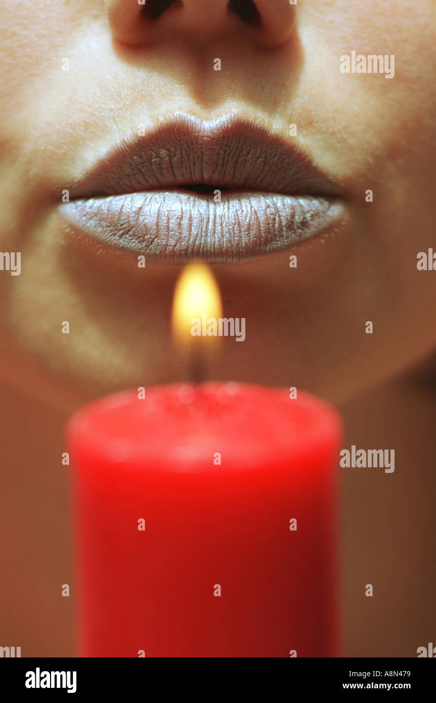 Mouth and candle Stock Photo - Alamy