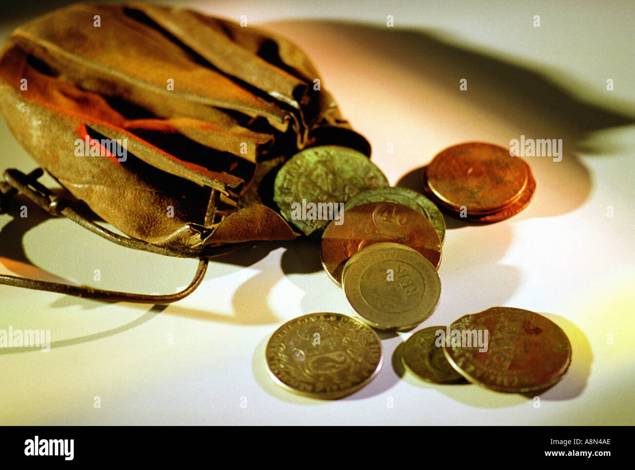 Leather sack with old coins Stock Photo - Alamy
