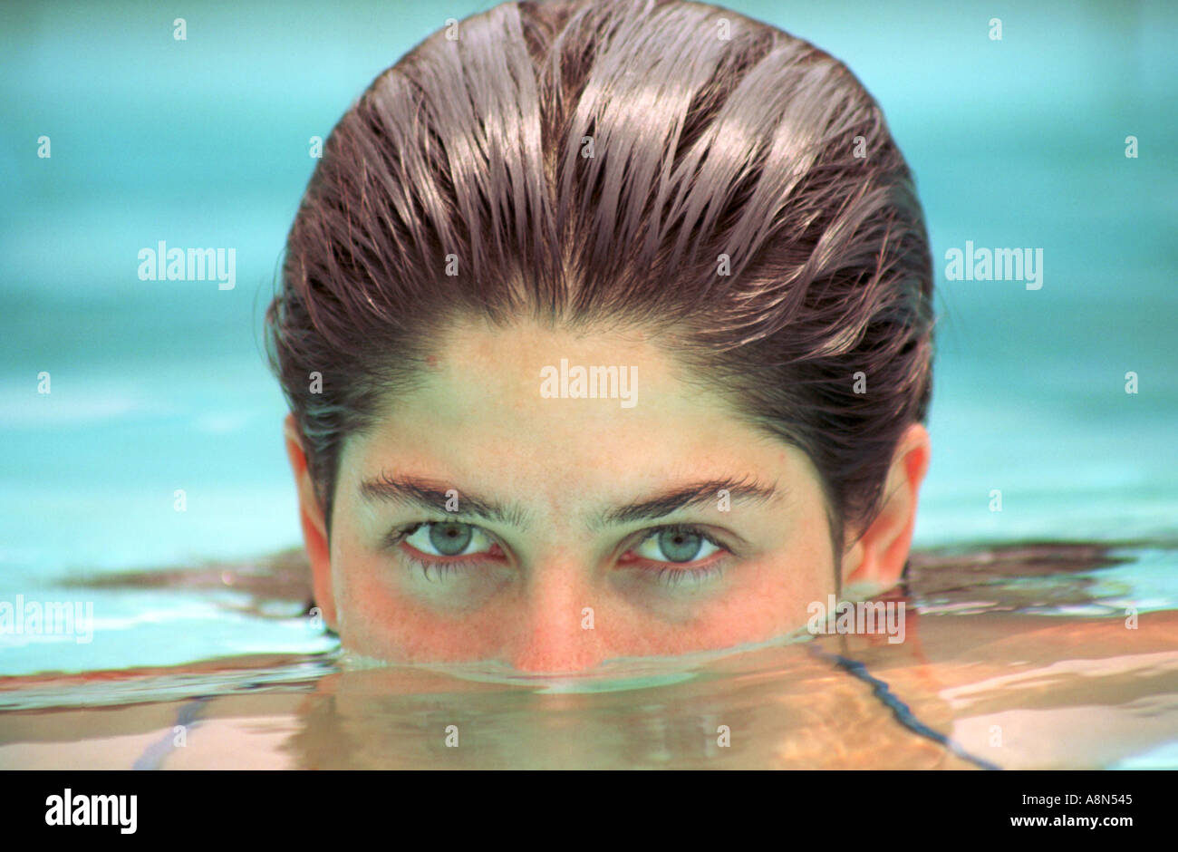 Feminine face in the pool Stock Photo - Alamy
