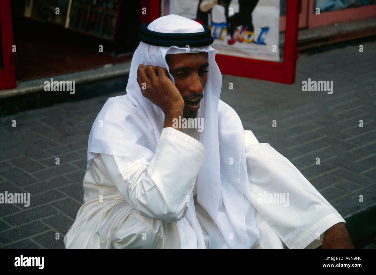 Dubai UAE Local Man On Mobile Souk Area Stock Photo - Alamy