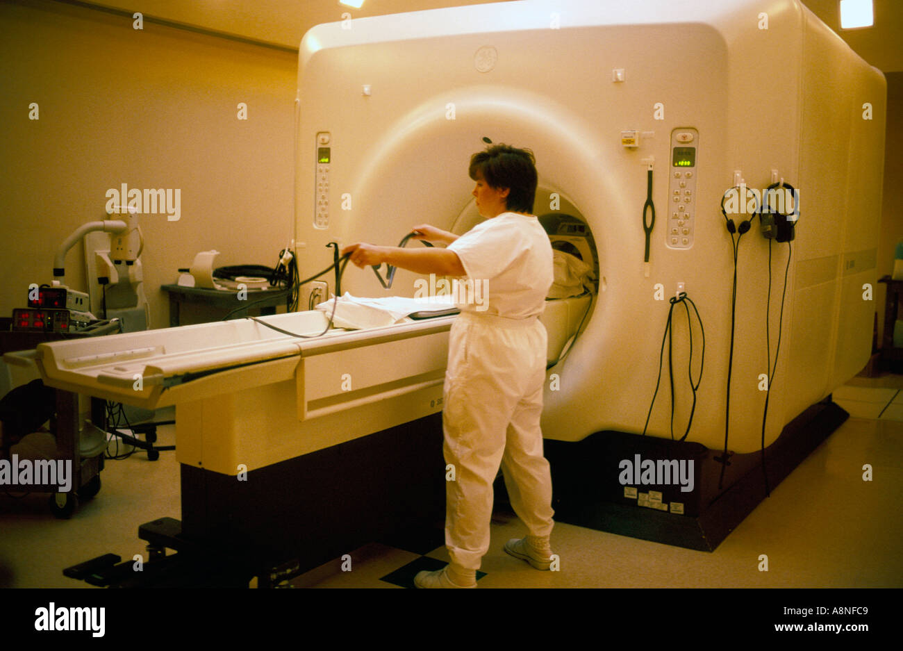 Magnetic Resonance Imaging MRI machine being used to scan and diagnose ...
