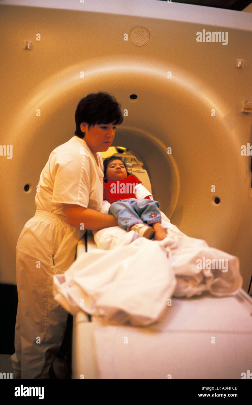 Magnetic Resonance Imaging MRI machine being used to scan and diagnose ...