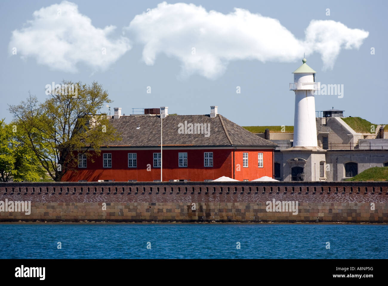 Lighthouse in harbour Stock Photo - Alamy