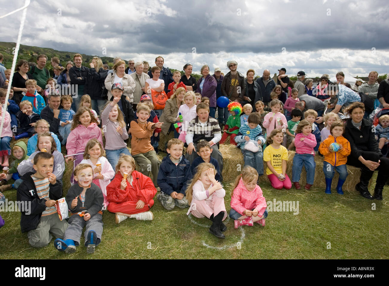 Children and adults enjoying Punch and Judy show Mayday 2007 ...