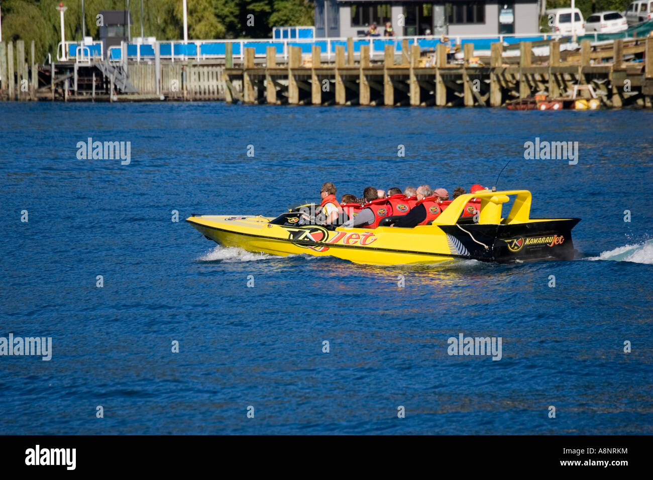 Bright yellow jet boat on Lake Wakatipu Queenstown New Zealand Stock ...