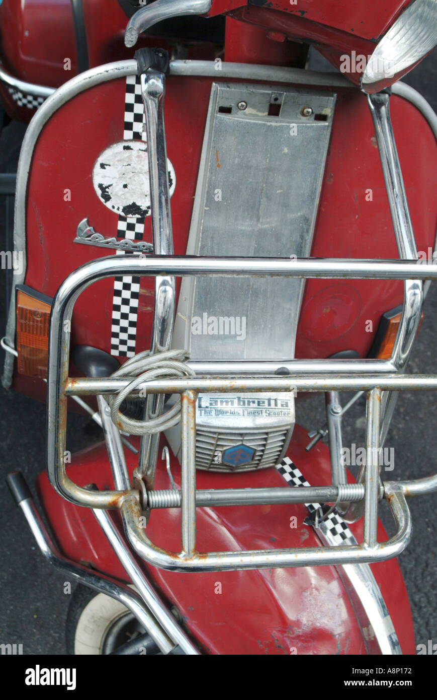 Vespa Lambretta red scooter moped Stock Photo - Alamy