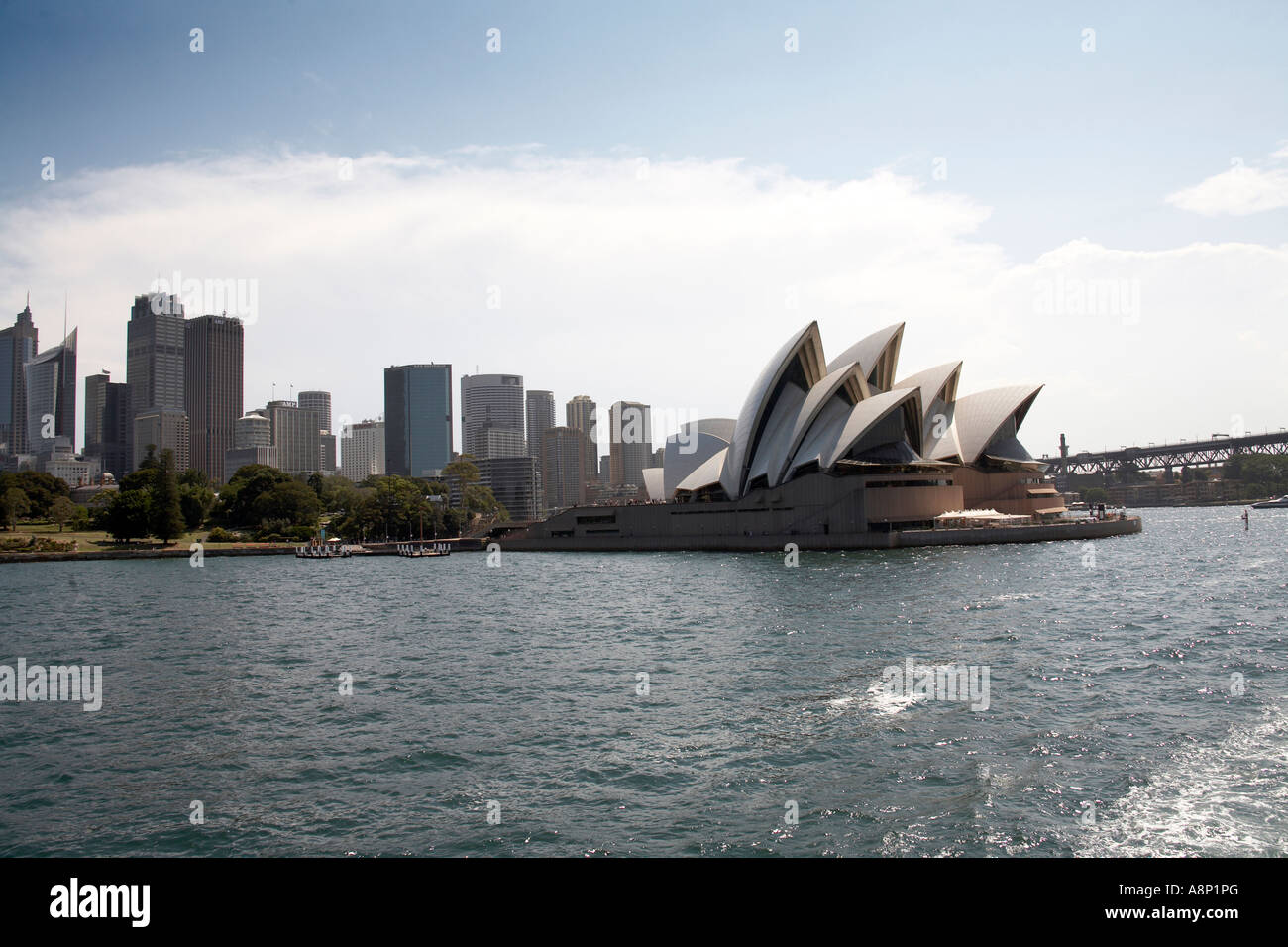 Opera House with city centre business district buildings skyline and ...