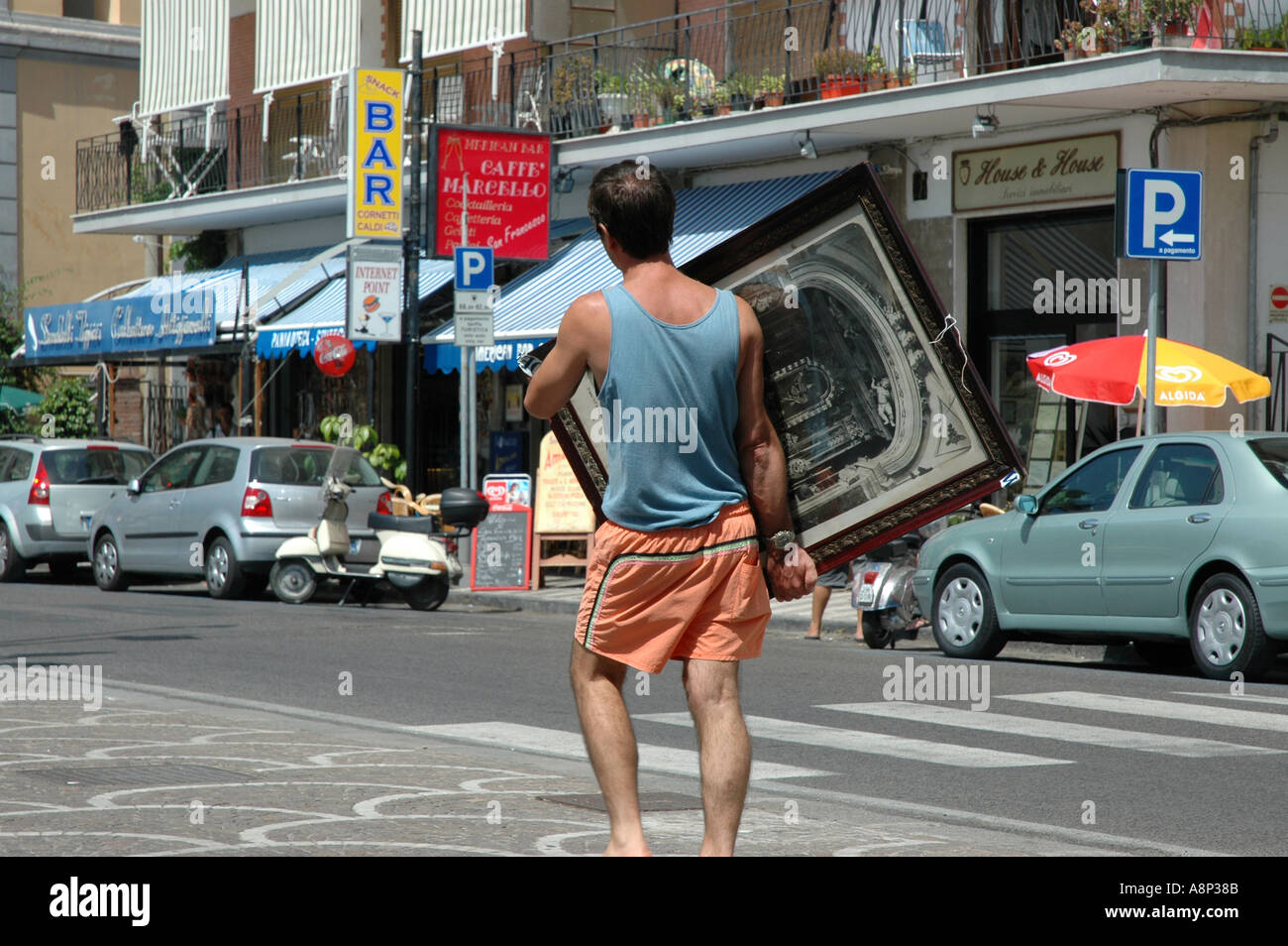 Man walking with a mirror Maori Amalfi coast Stock Photo - Alamy