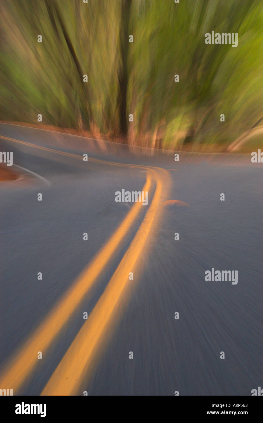 divided country road in motion Stock Photo - Alamy