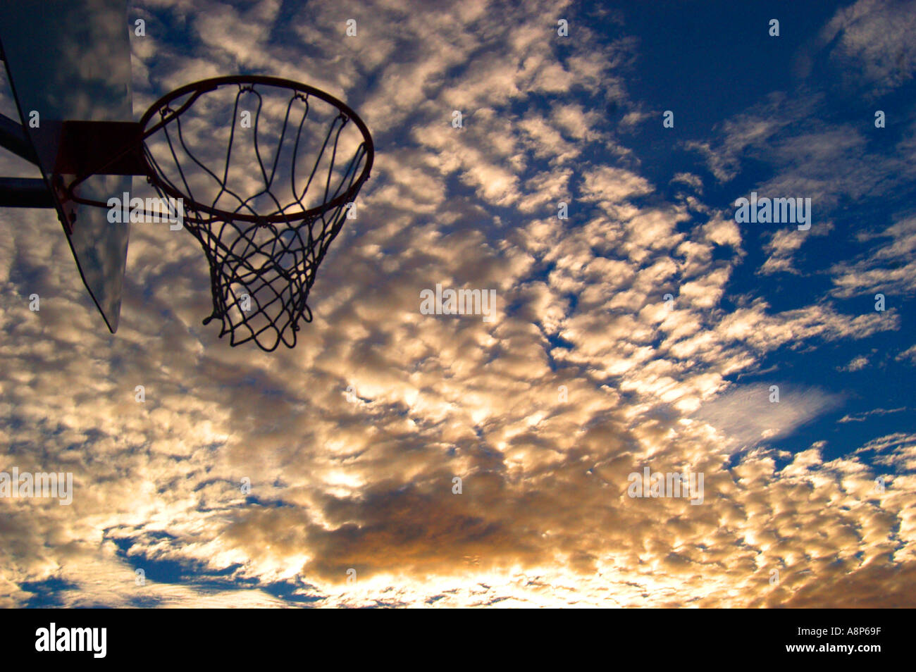 basketball hoop and cloudy sky Stock Photo - Alamy