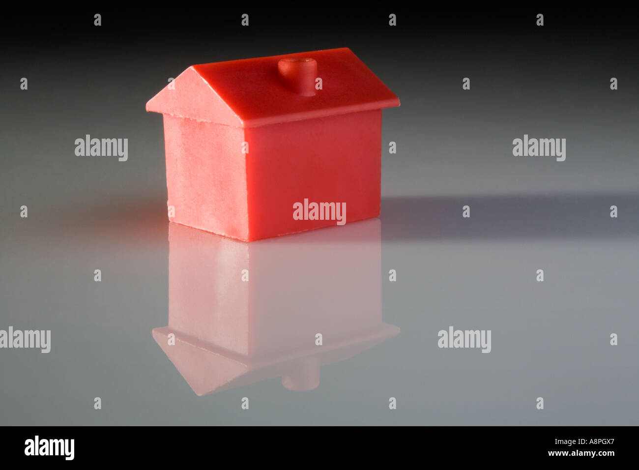 red monopoly hotel on white background Stock Photo - Alamy