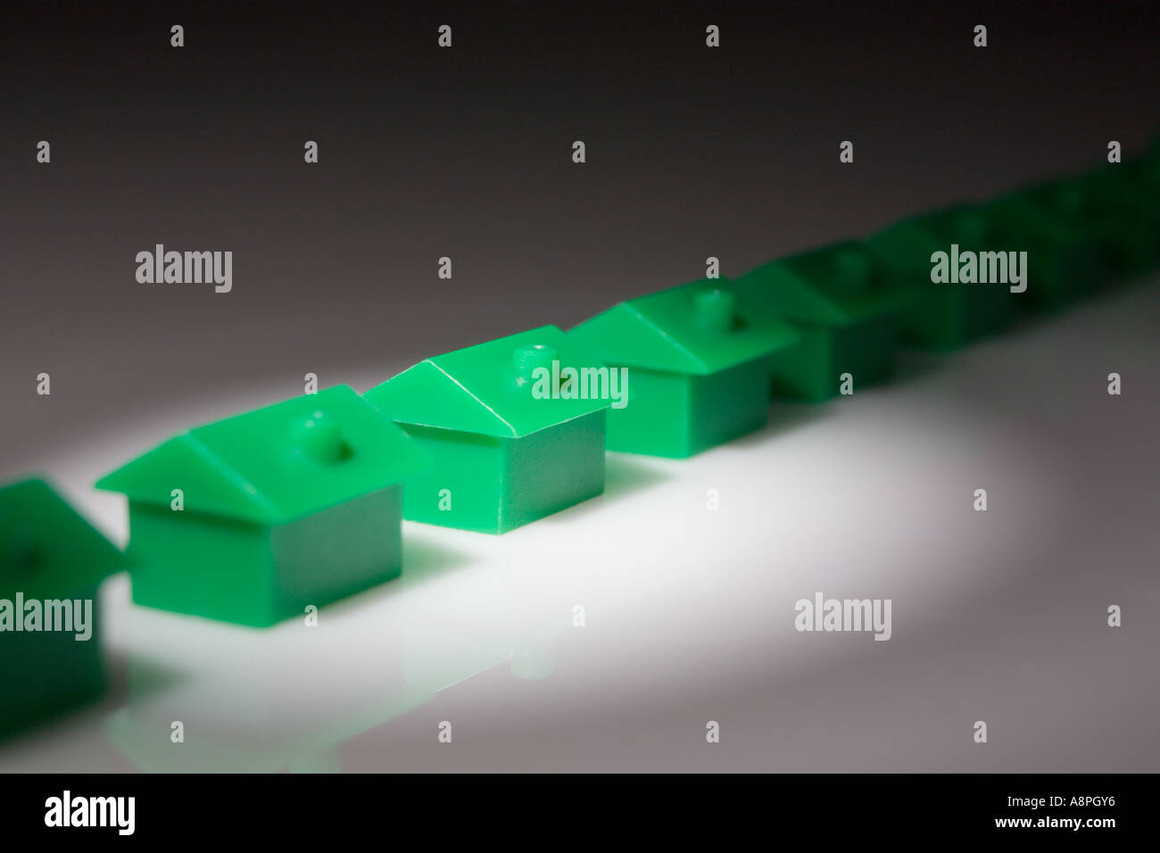 monopoly house in a line Stock Photo - Alamy