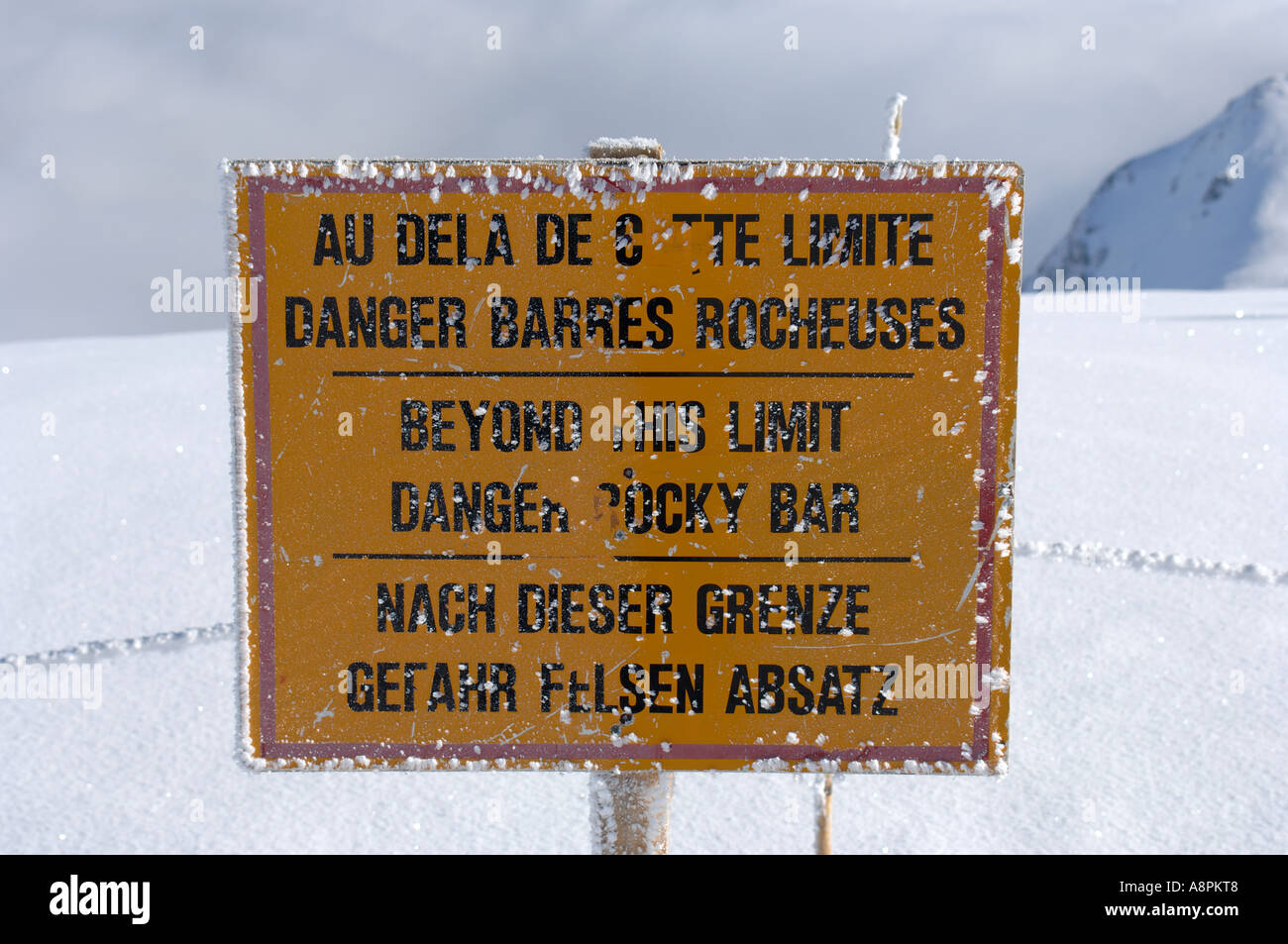 off piste warning sign covered with frost Stock Photo - Alamy