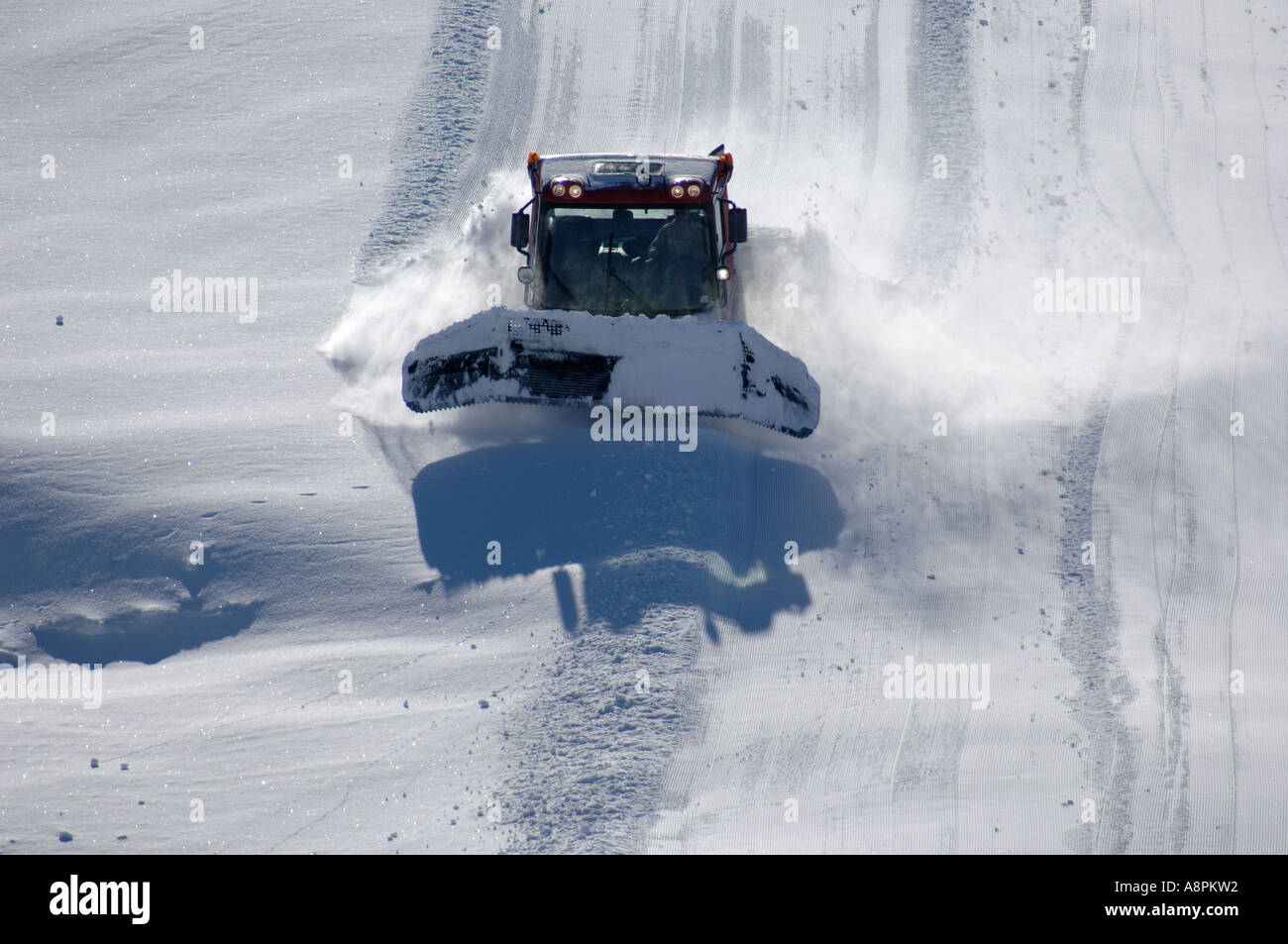 piste basher preparing ski piste in the french alps Stock Photo - Alamy