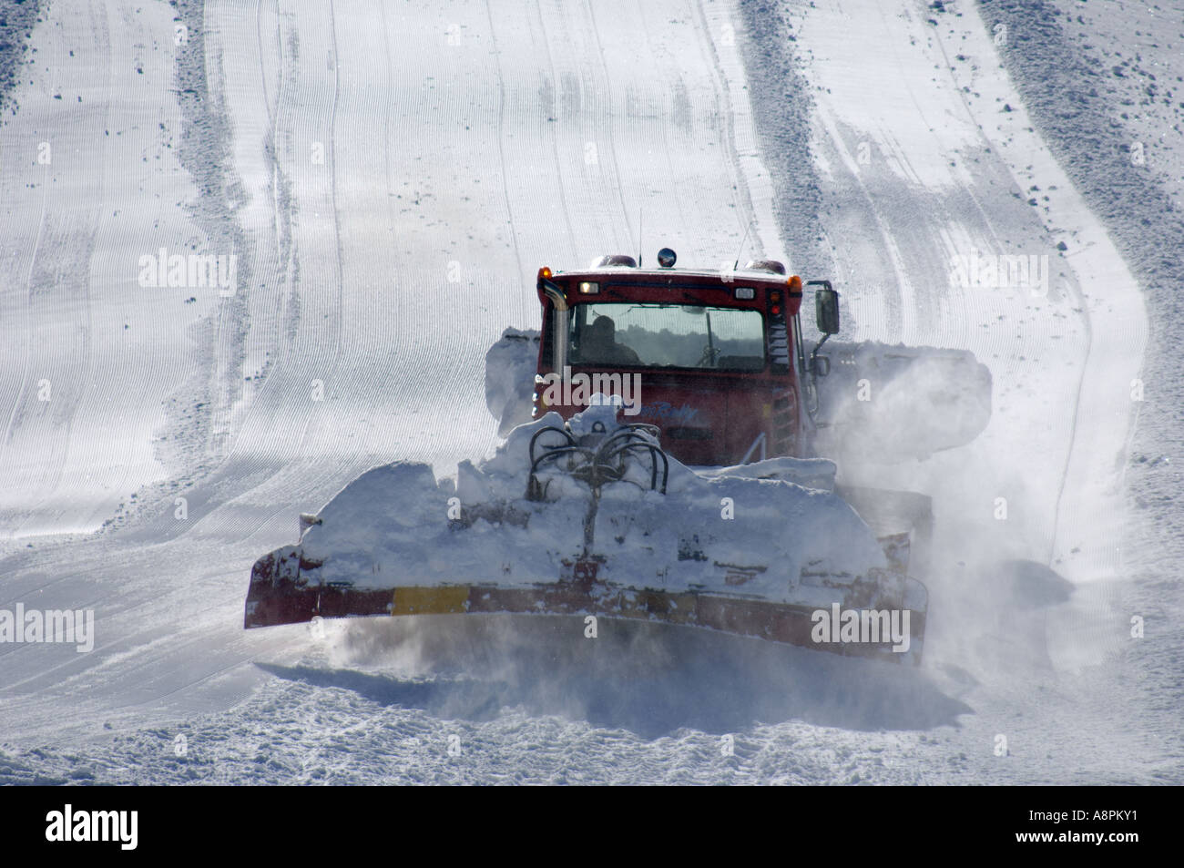 Piste basher preparing a piste in the French alps Stock Photo - Alamy