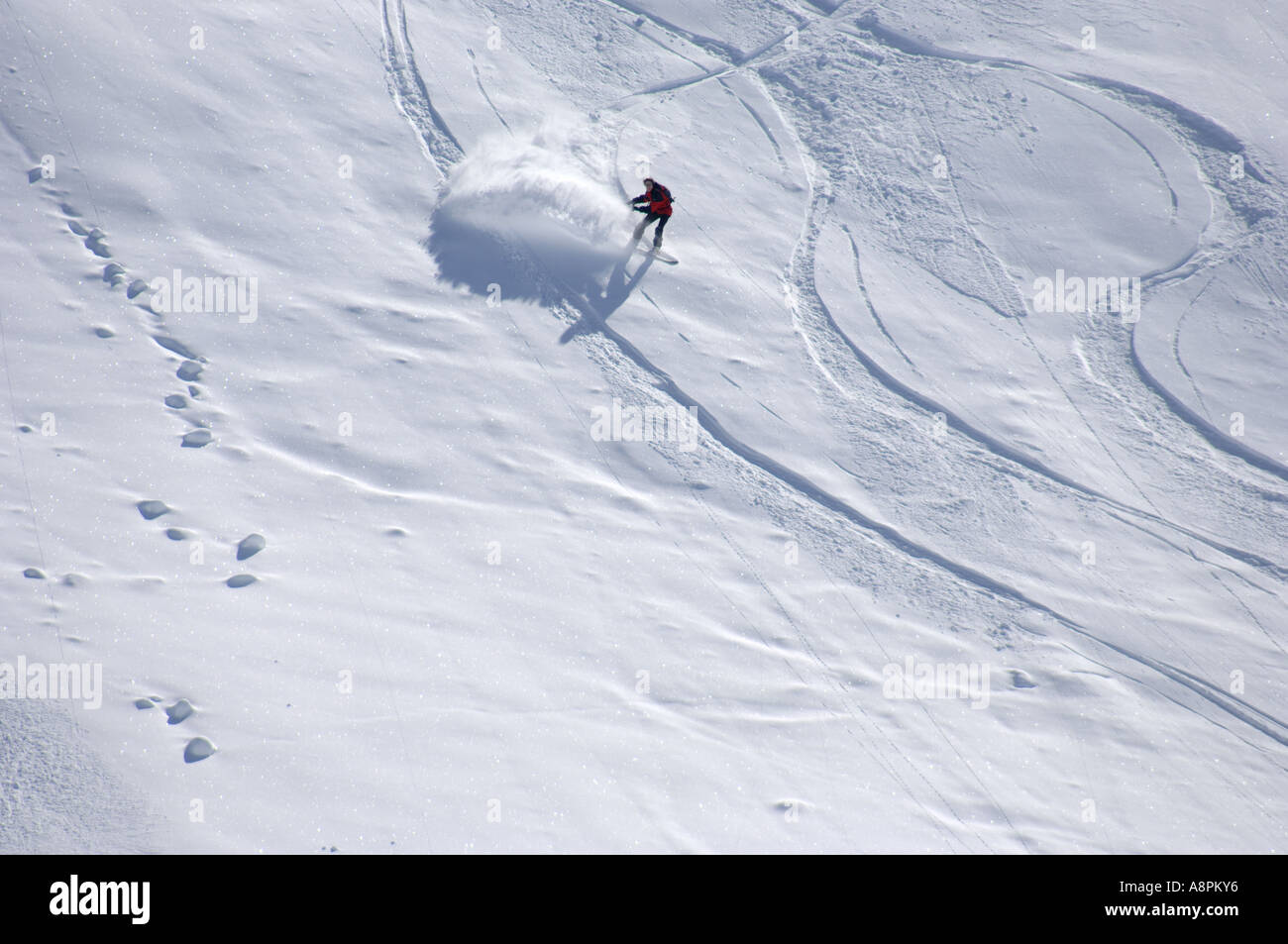 Snowboarder in steep slope hi-res stock photography and images - Alamy