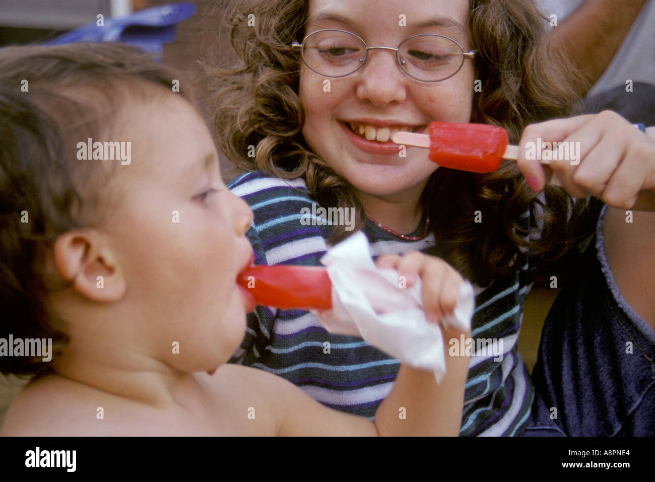 Child smiling with popsicle hi-res stock photography and images - Alamy