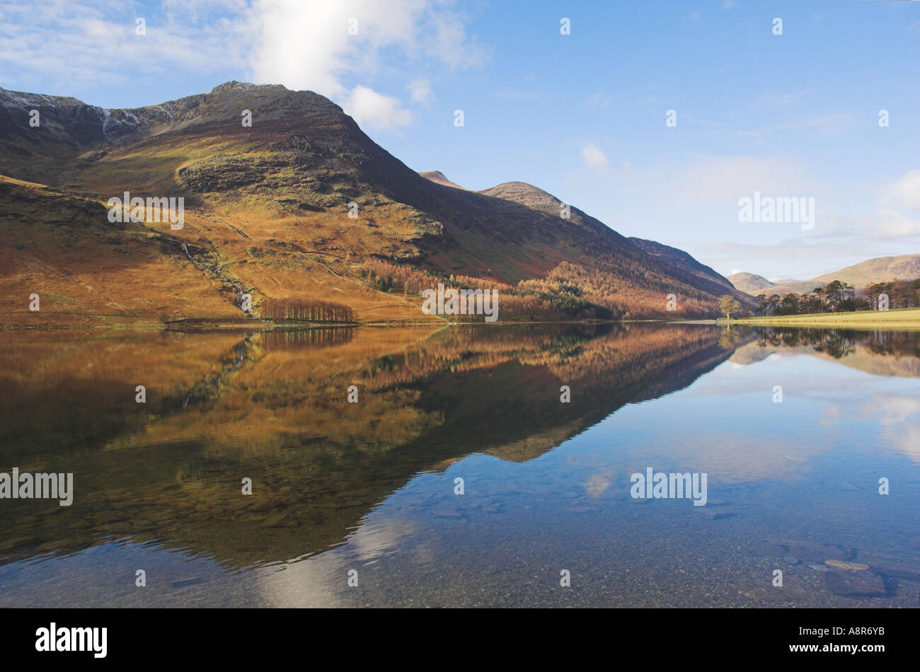 Buttermere still and mirrored Lake District National Park Cumbria England UK GB EU Europe Stock ...