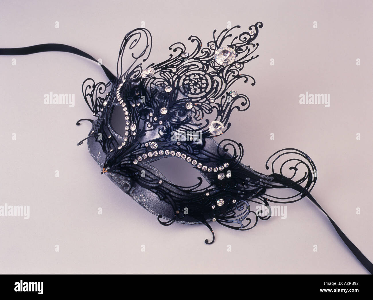 party mask with silk ties Stock Photo - Alamy