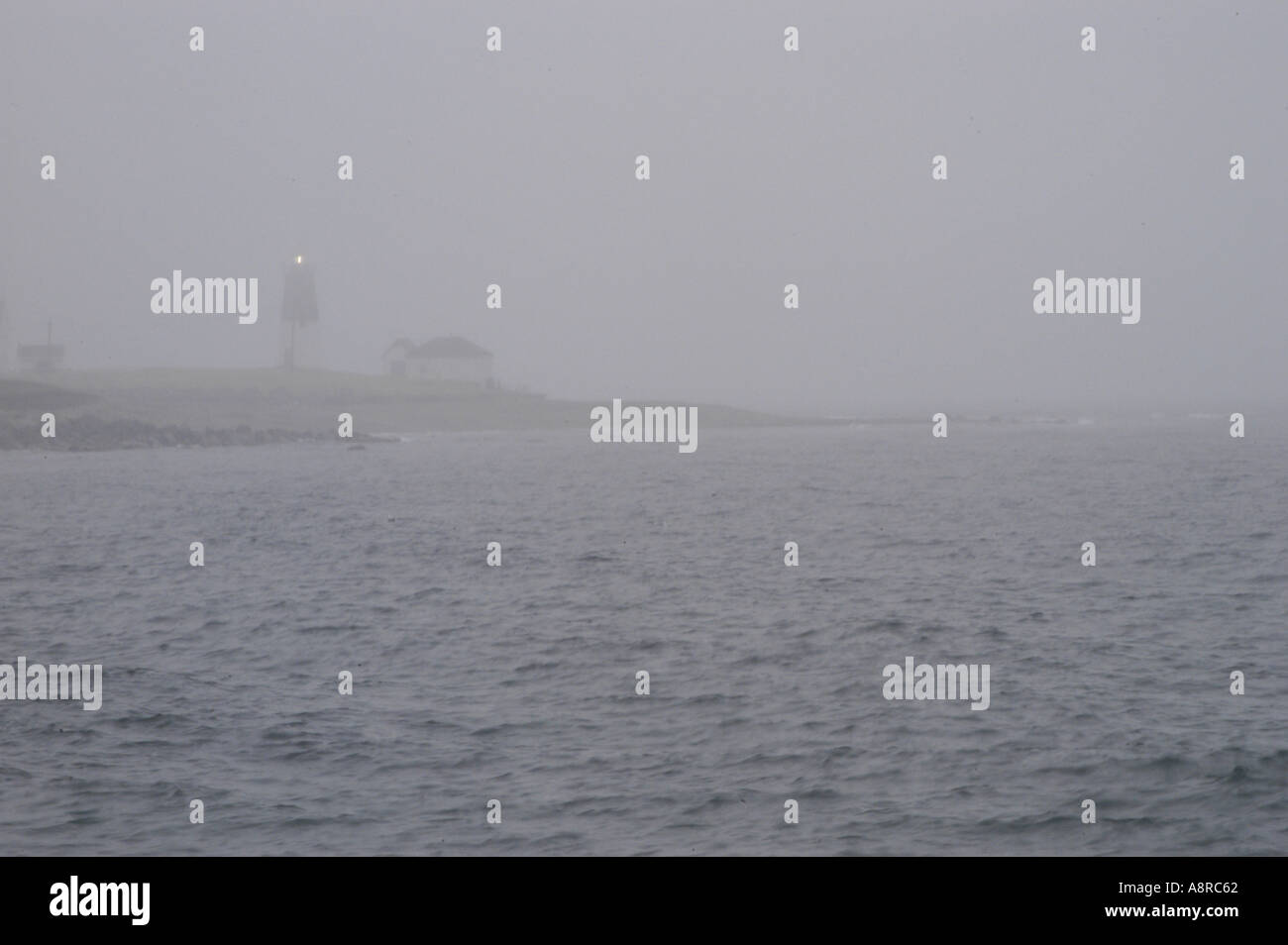 Lighthouse in fog Pt Judith RI USA Stock Photo - Alamy