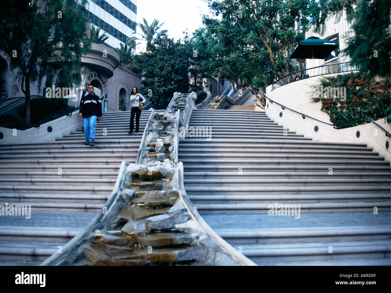 People walking down the steps of Bunker Hill with a water feature down ...