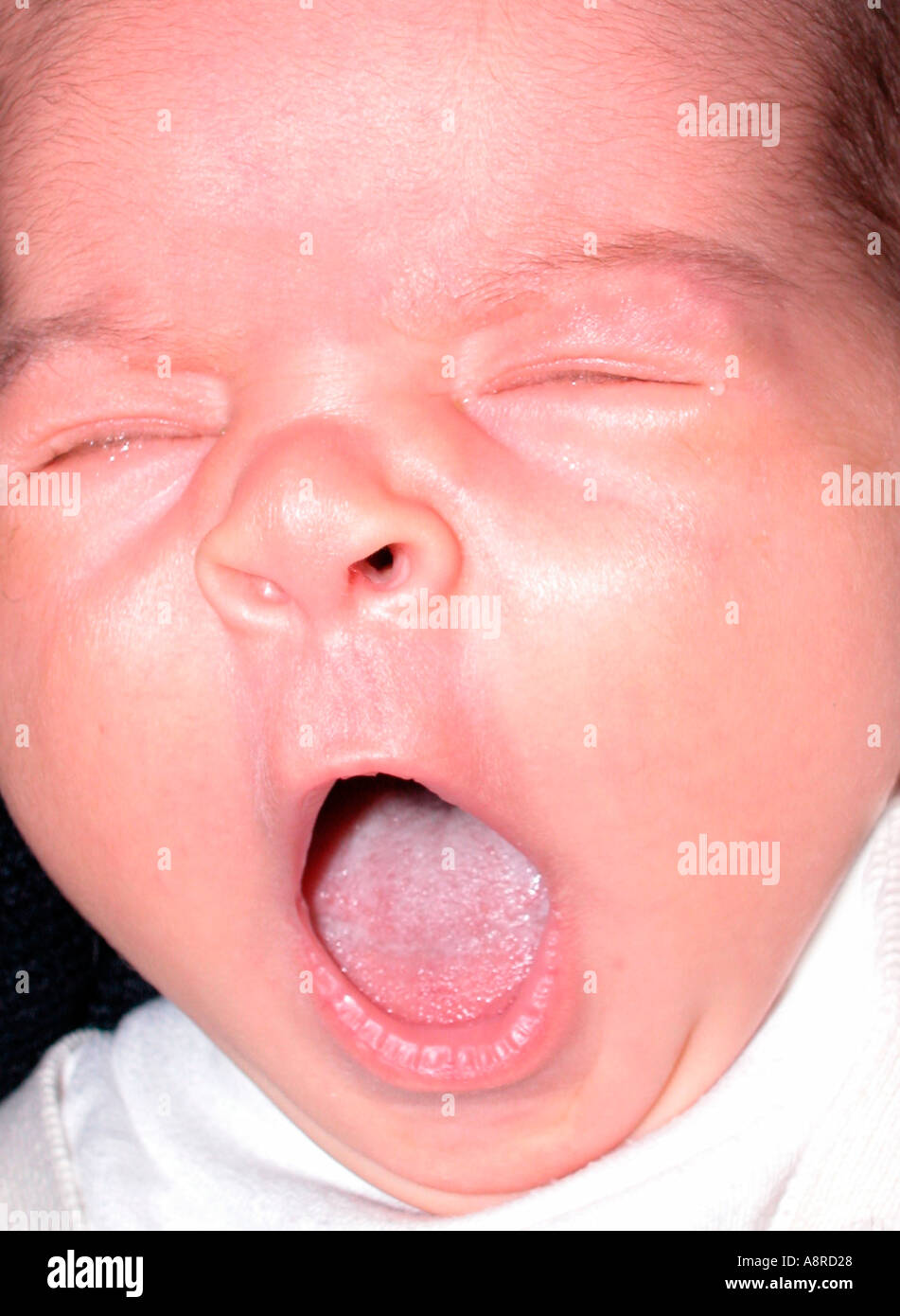 MR baby yawning Stock Photo - Alamy