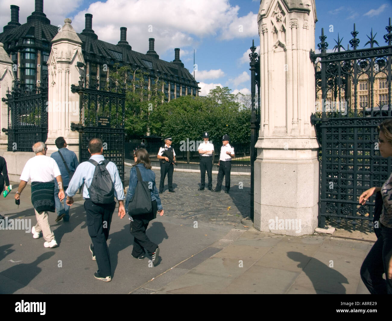 Armed Police officers guard the Houses of Parliament London England ...