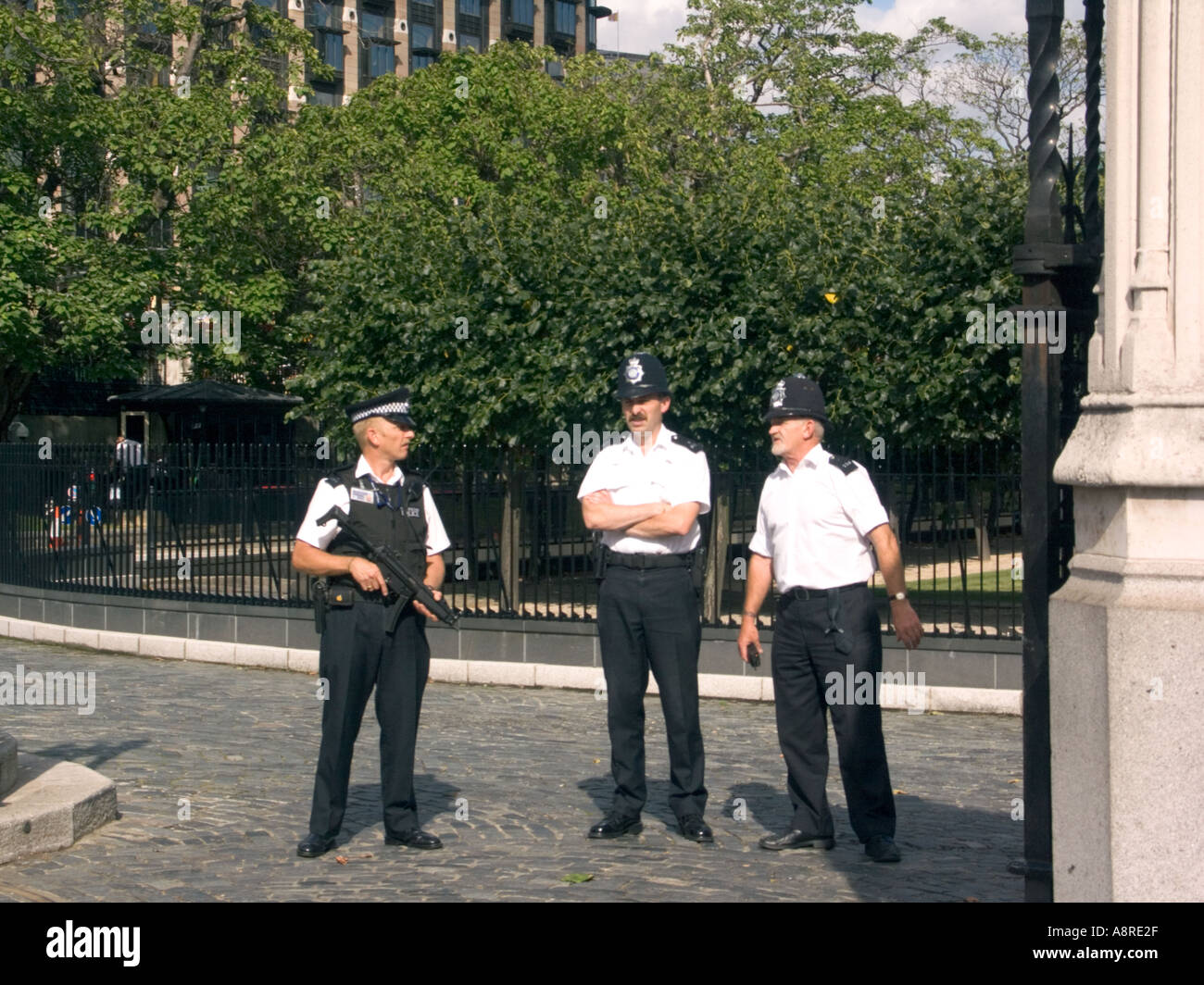 Armed Police officers guard the Houses of Parliament London England ...