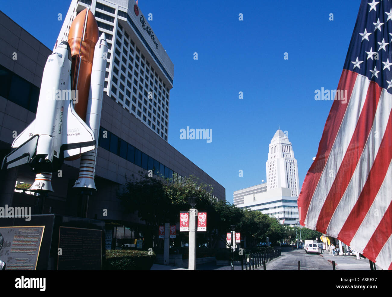 A model of the space shuttle and a flag in the streets of Little Tokyo ...