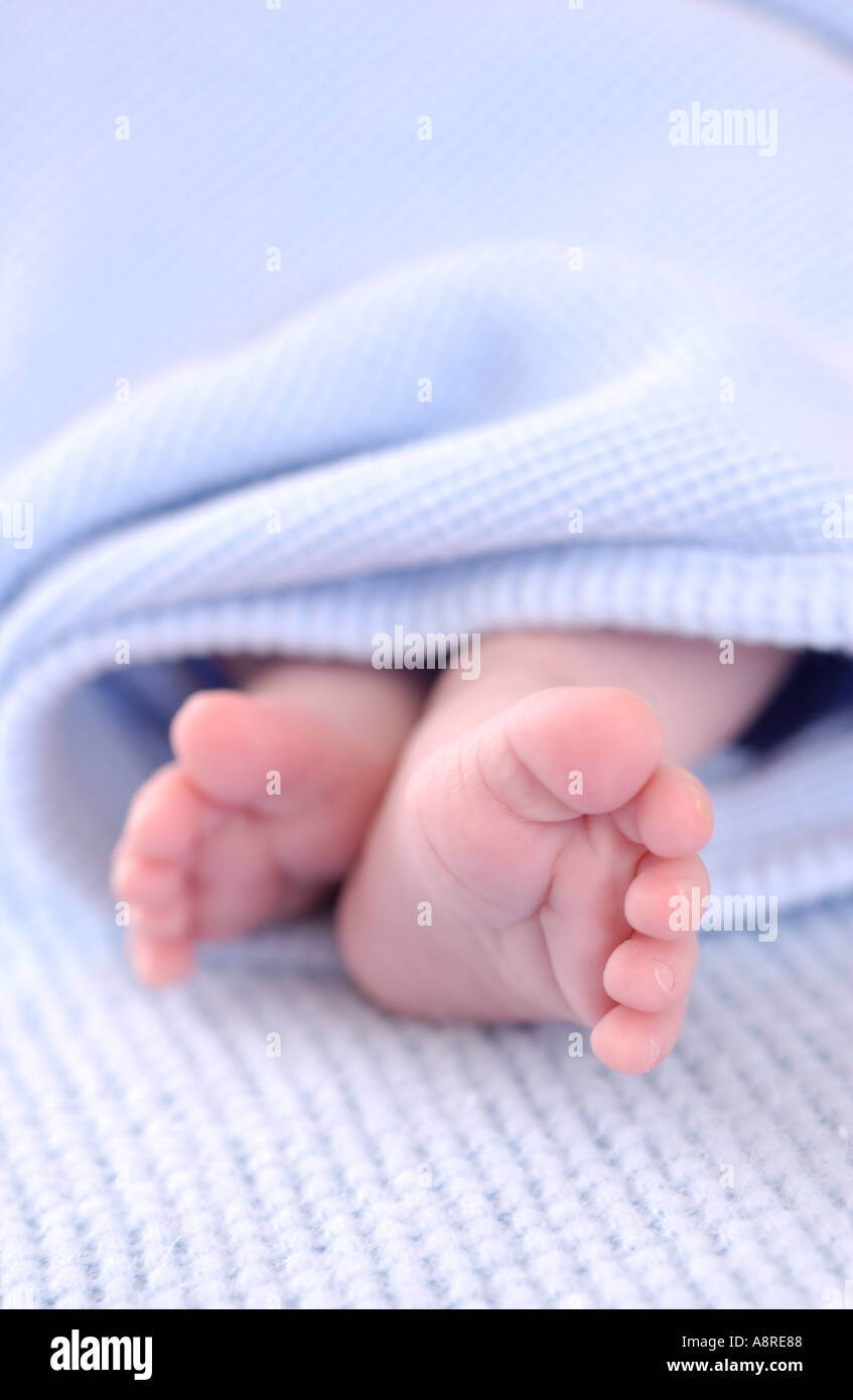 Blue baby feet hi-res stock photography and images - Alamy