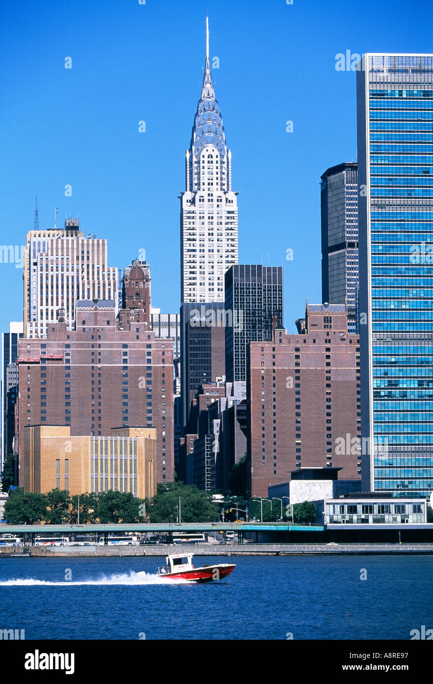 View of Chrysler building amid other skyscrapers in Midtown Manhattan ...