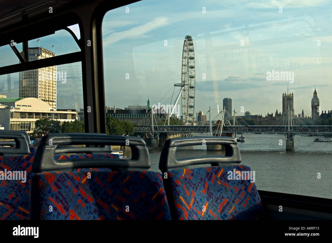 Top floor London bus window view of the River Thames the London Eye ...