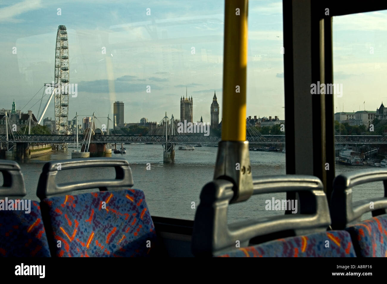 Top floor London bus window view of the River Thames the London Eye ...