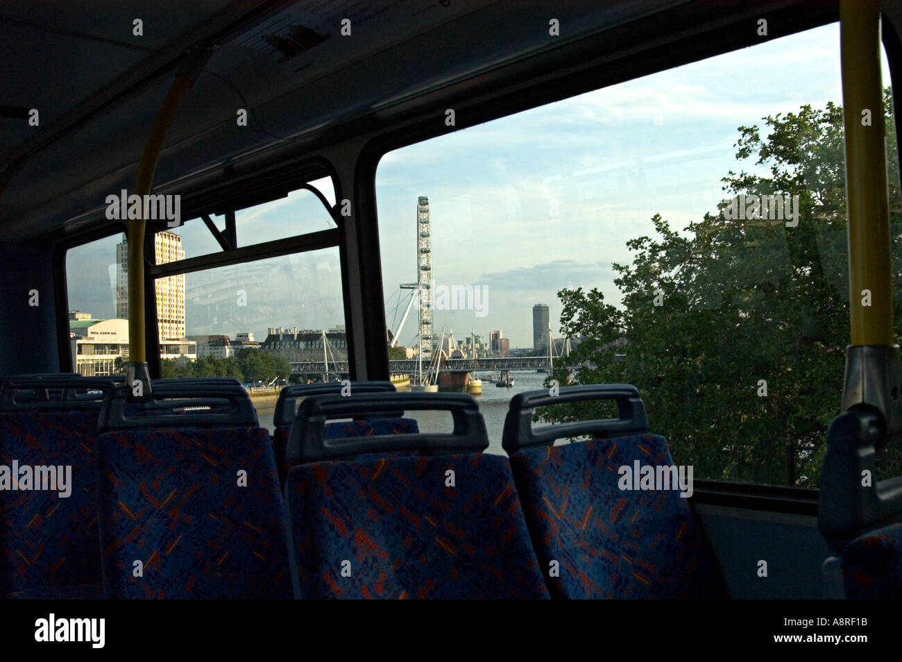 Top floor London bus window view of the River Thames the London Eye ...