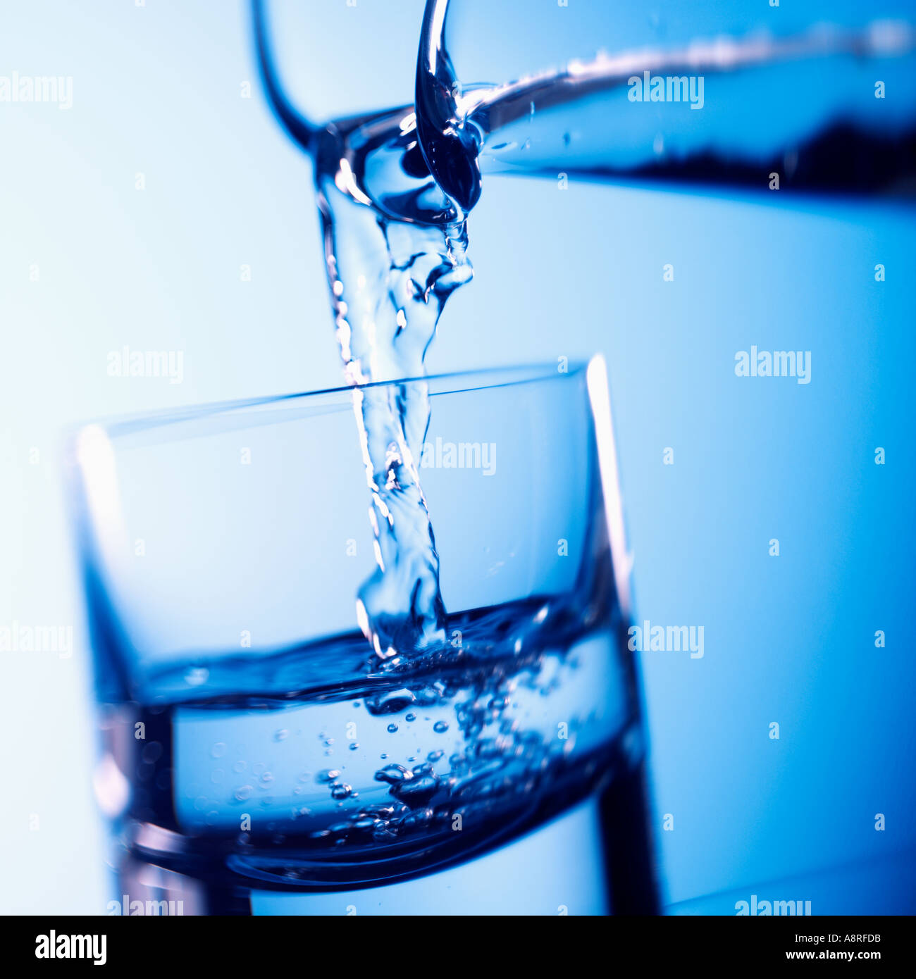 Half full glass water pitcher hi-res stock photography and images - Alamy