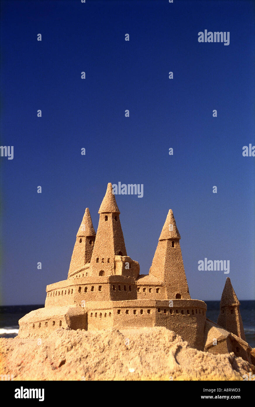 Sand castle on the beach on a nice sunny day Stock Photo - Alamy