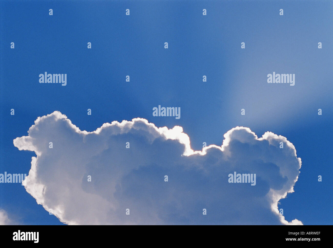Close up of a single cloud in the sky that appears to be blocking the ...