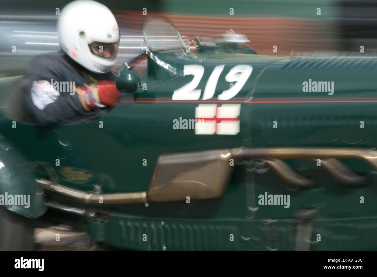 A green Bentley Royce V12 8000 cc vintage racing car accelerates at ...