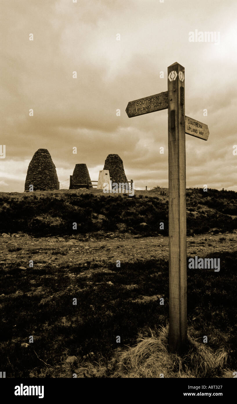 Southern Upland Way sign with three brethern behind Stock Photo - Alamy
