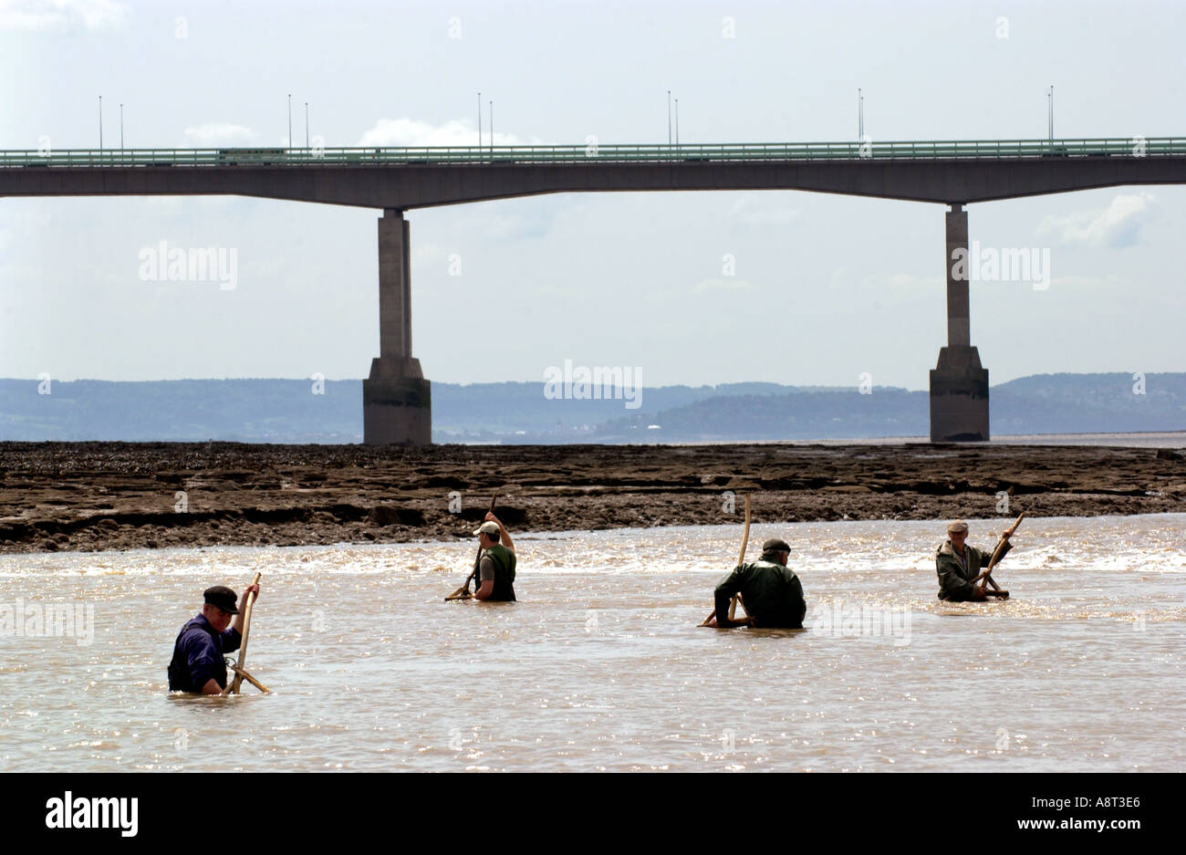 Local men fishing for salmon using a traditional Lave Net on the ebbing ...