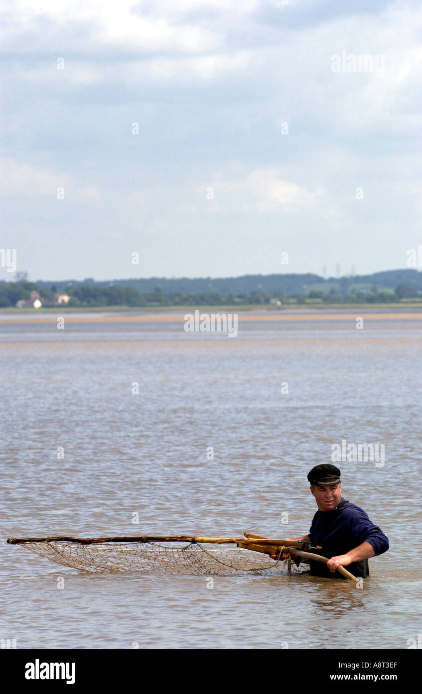 Local men fishing for salmon using a traditional Lave Net on the ebbing ...