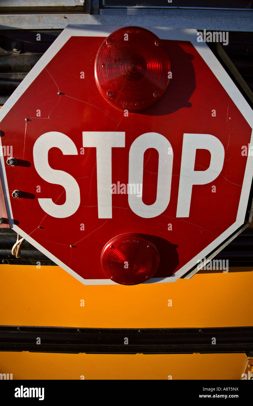 Stop sign on school bus Stock Photo - Alamy