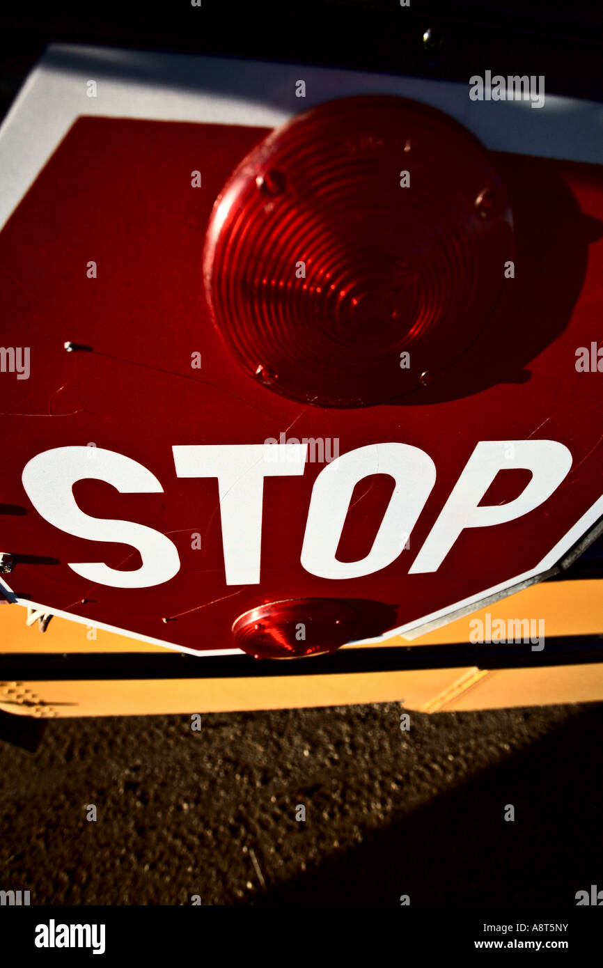 Stop sign on school bus Stock Photo - Alamy