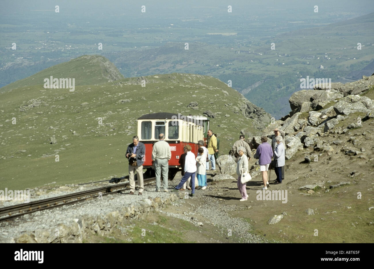 Snowdon mountain railway train & sightseeing passengers waiting to re ...