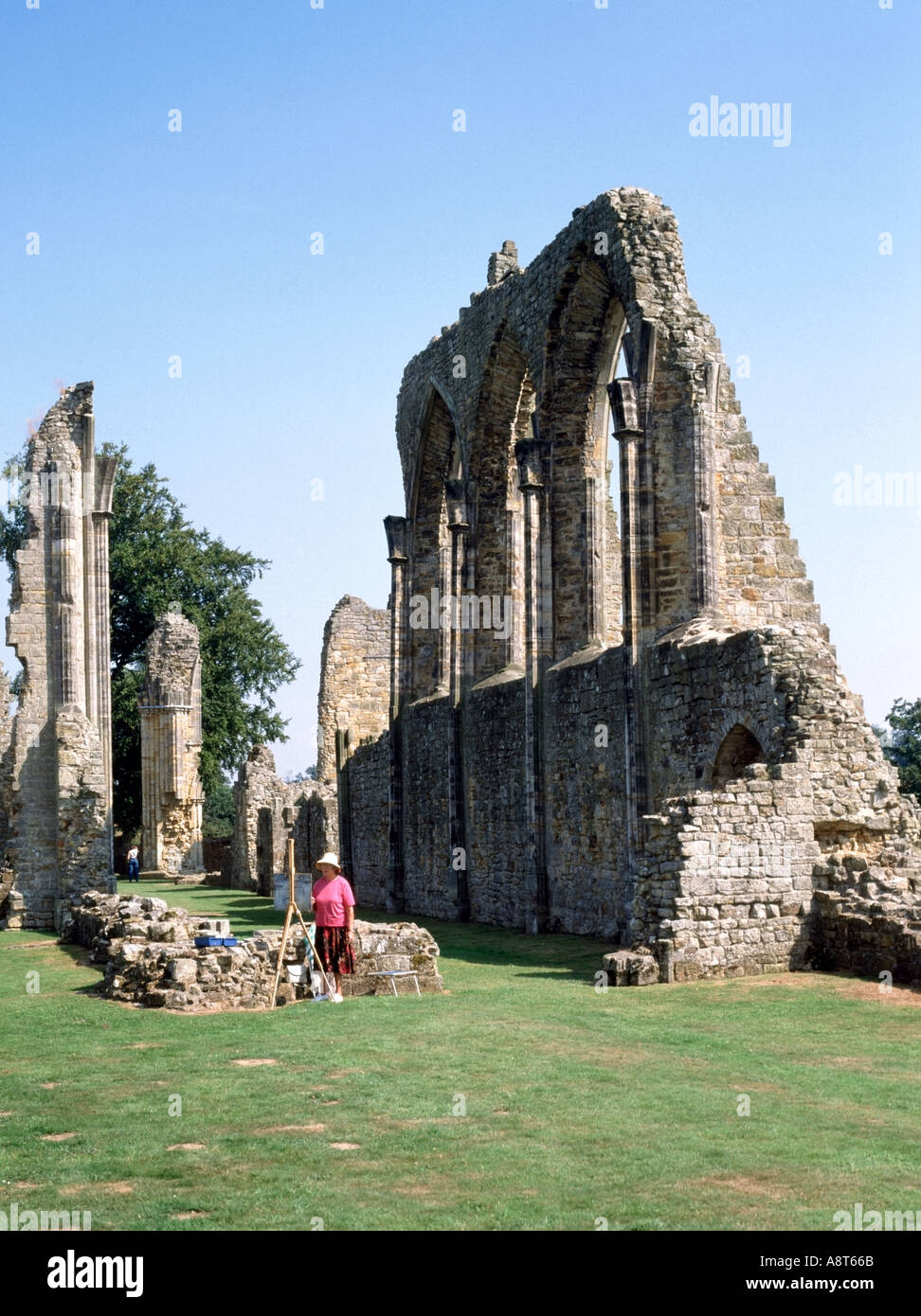 Bayham Abbey ruins in the care of English Heritage with artist painting ...