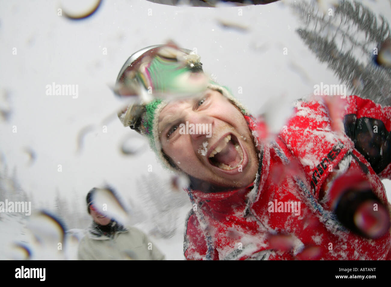 crazy young man in the snow, Austria, Alps Stock Photo - Alamy