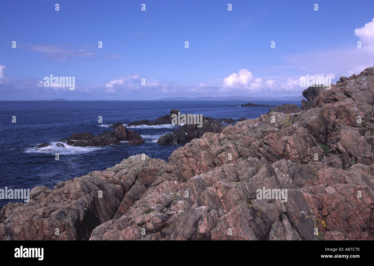 Red rocks on Iona Scottish Island Stock Photo - Alamy
