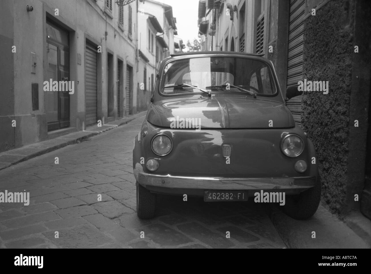 Italian street scene with Fiat car Stock Photo - Alamy